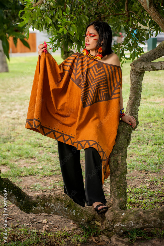 beautiful young peruvian woman of the yanesha culture posing with ...