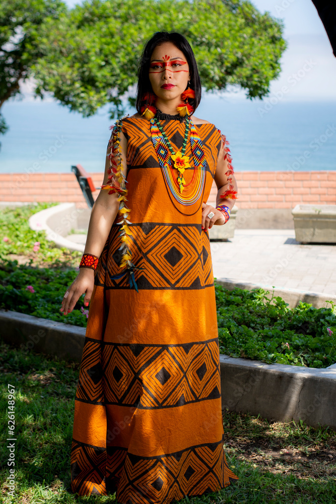 beautiful young peruvian woman of the yanesha culture posing with ...