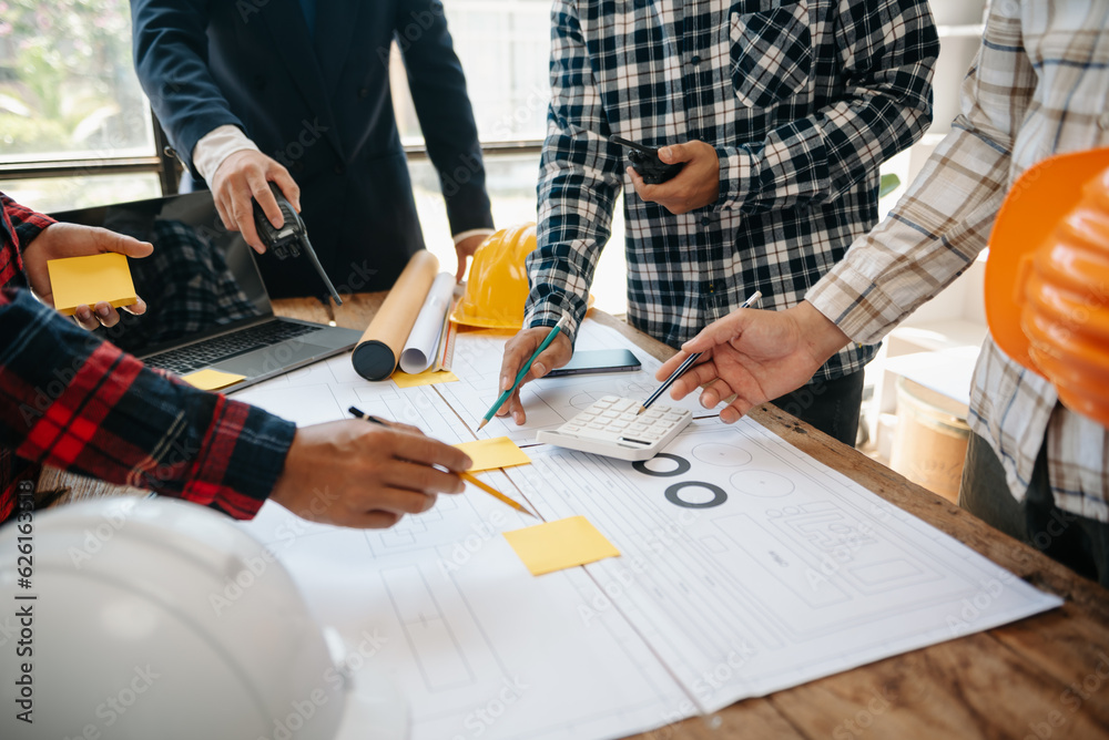 Engineer teams meeting working together wear worker helmets hardhat on ...