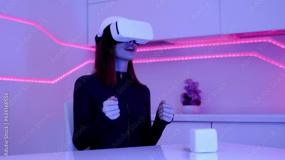 Vidéo Stock Woman in futuristic costume. Female in modern VR glasses interacting with network ...