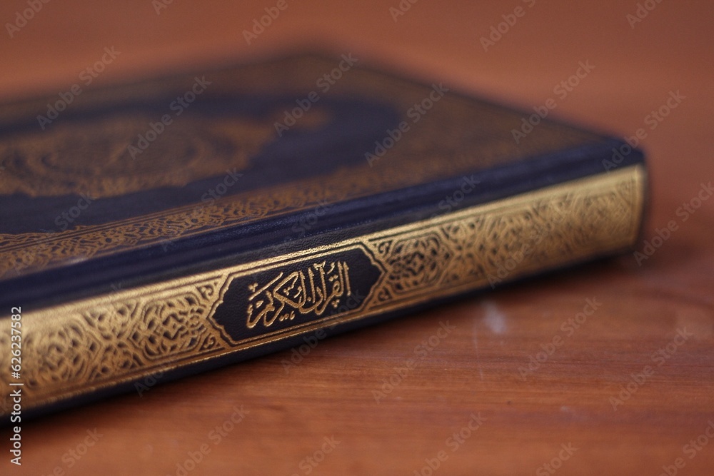 Islamic concept - The Holy Al Quran with written Arabic calligraphy ...