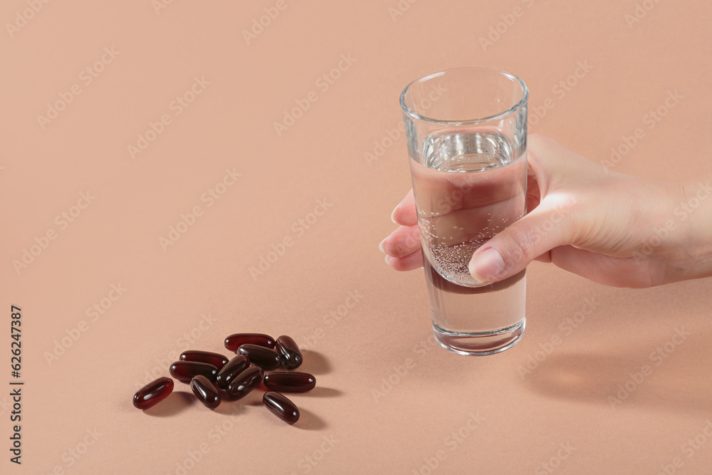 Diet, nutrition, healthy eating concept. Oil filled capsules of food ...