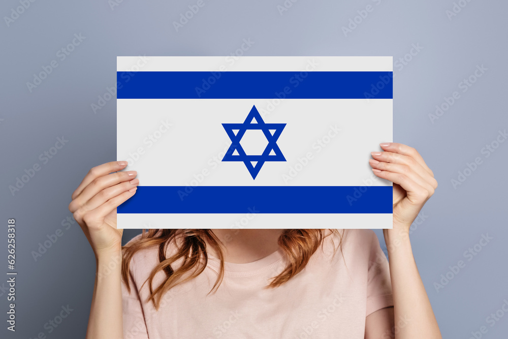 Israel news concept. Female hands holding an information piece of paper ...