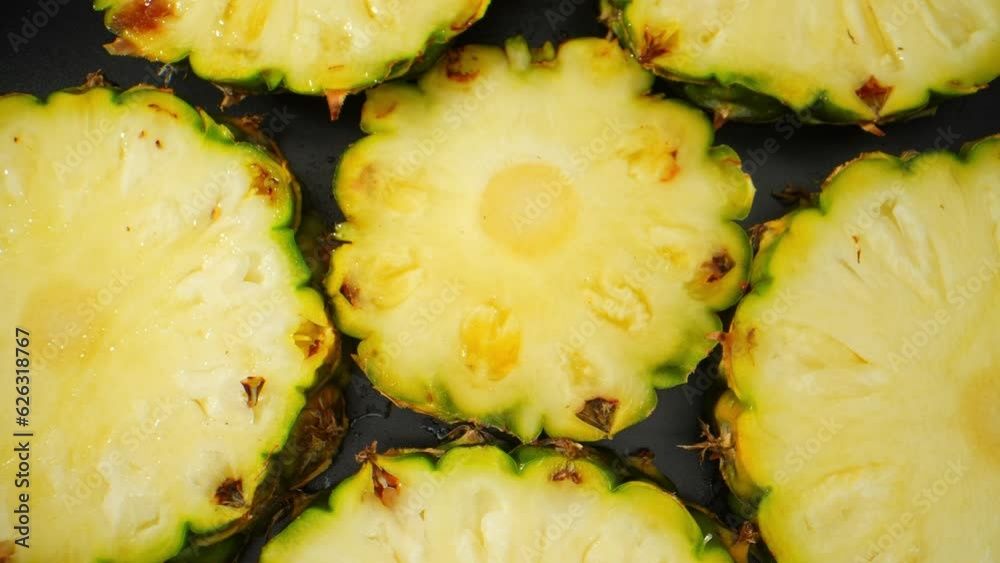 A tantalizing macro adventure. Watch as a succulent pineapple slice ...