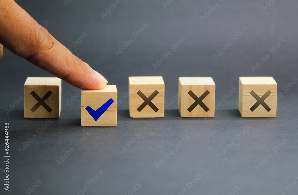 wooden cube with wrong and right sign icon. selection or checklist ...