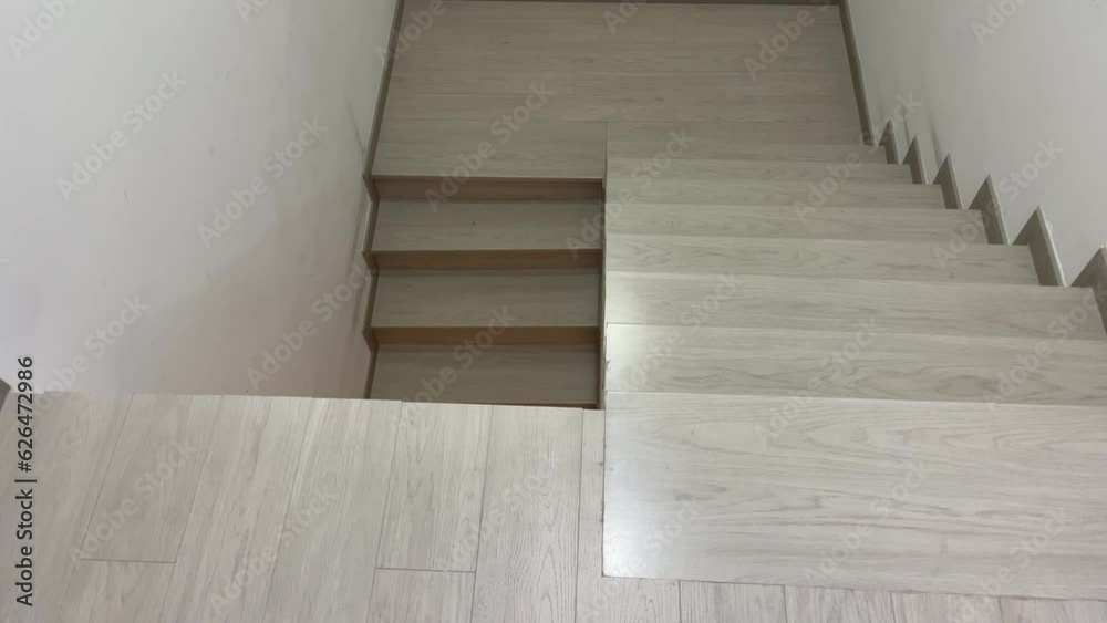 Empty stairs first person point of view staircase interior with white ...