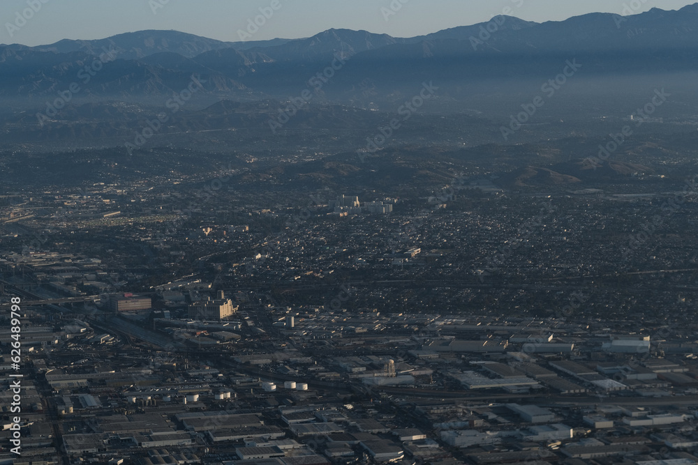 A freeway cuts through a cityscape of Los Angeles,' urban sprawl, with ...