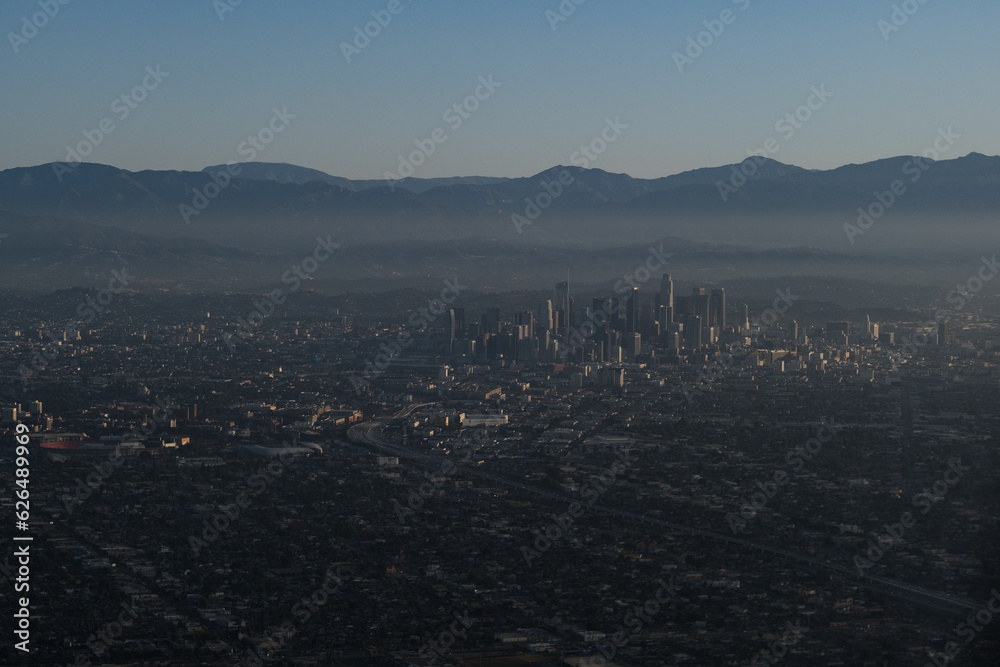 The hazy, polluted air obscures an aerial view from high above Los ...