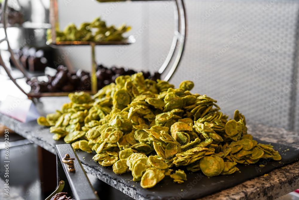 pile cocoa matcha chocolate corn flakes from green tea leaves on black ...