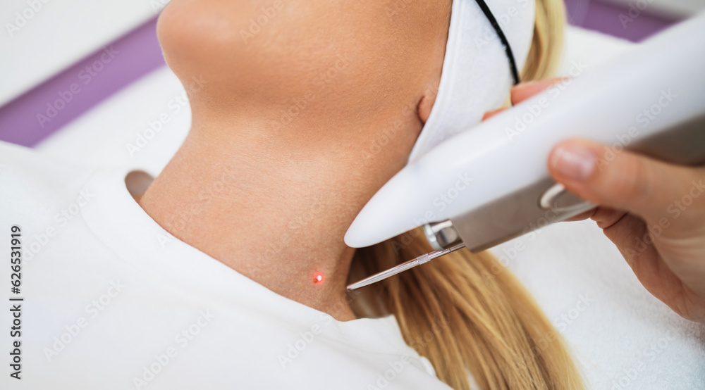 Beautiful young female patient receiving modern medical and beauty ...