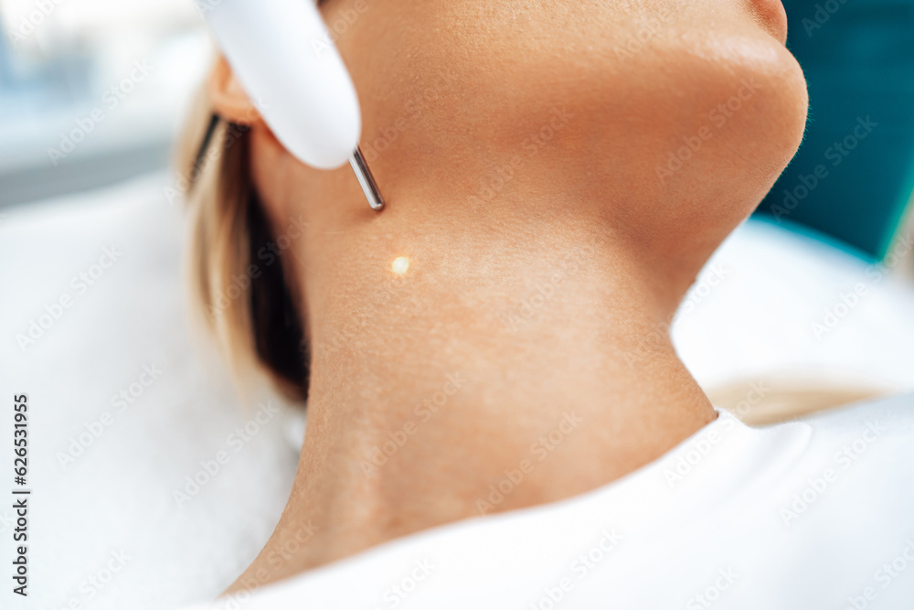 Beautiful young female patient receiving modern medical and beauty ...