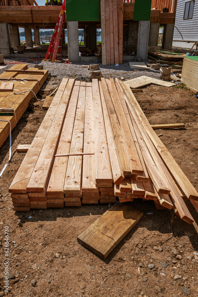 View of Select pine 2X4 framing lumber delivered to a job for building ...