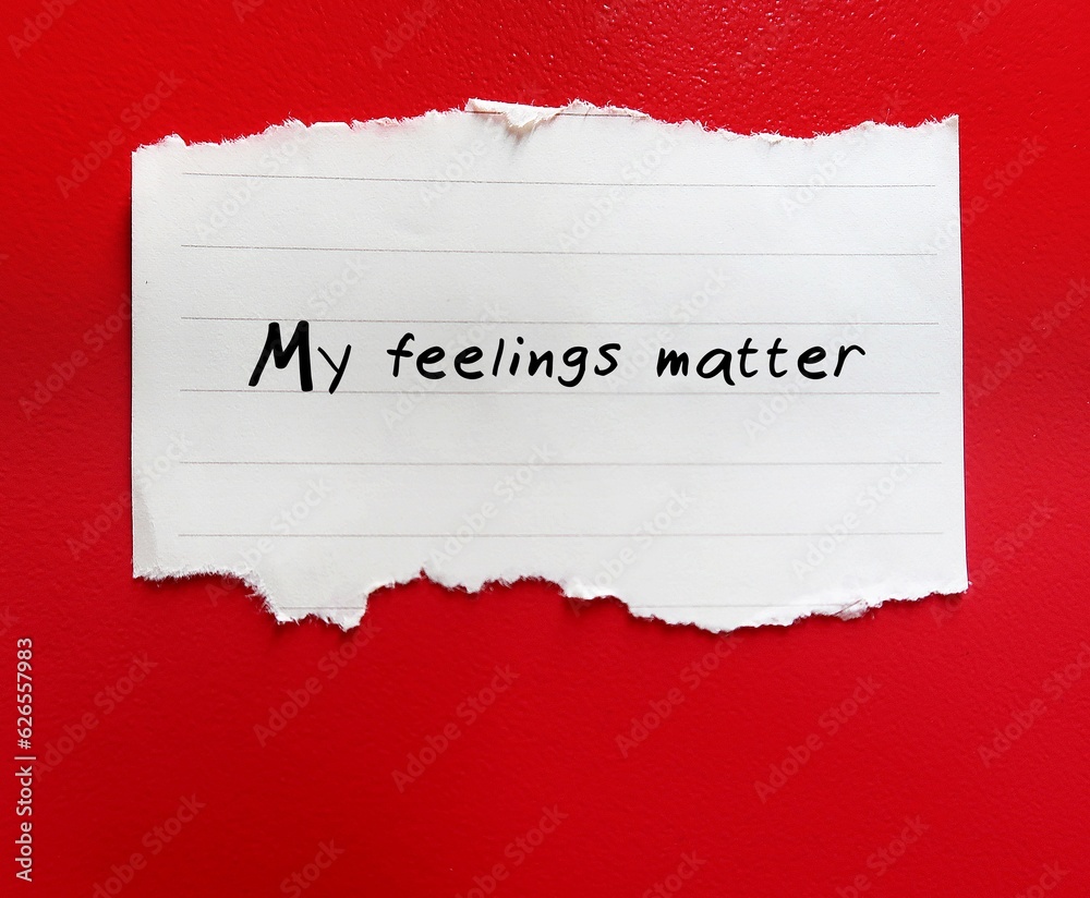 Torn note on orange background with handwritten text My Feelings Matter ...