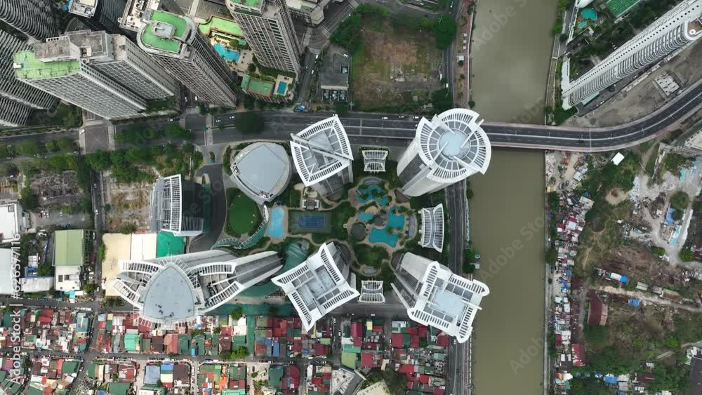 Manila cityscape at river banks aerial. Downtown area with cottages ...