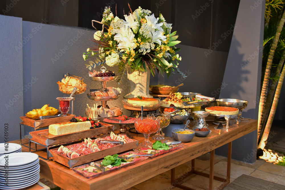buffet table with natural flower arrangement, buffet with stainless ...