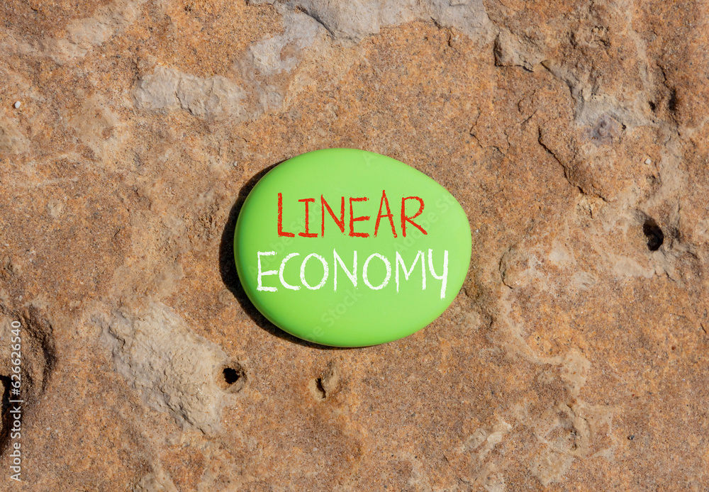 Linear economy symbol. Concept words Linear economy on beautiful green ...