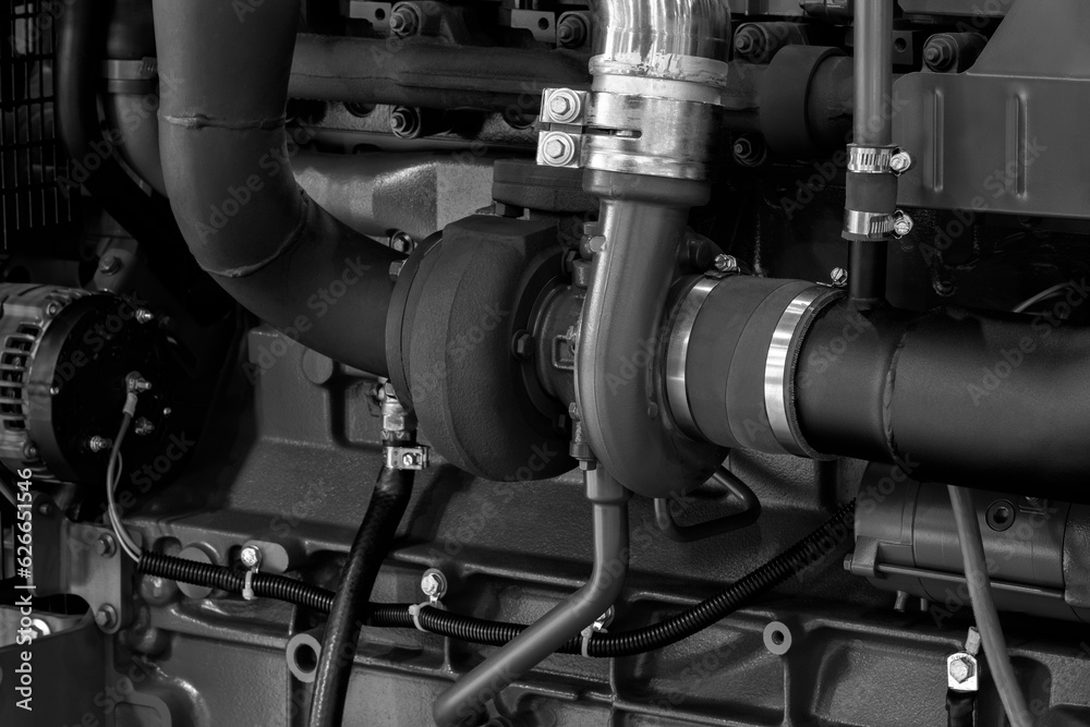 Black diesel engine. Fragment of a diesel motor close-up. Selective on ...