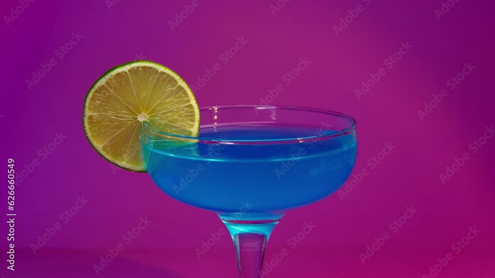 barbie cocktail. barbie core. Professional barman decorates a blue ...