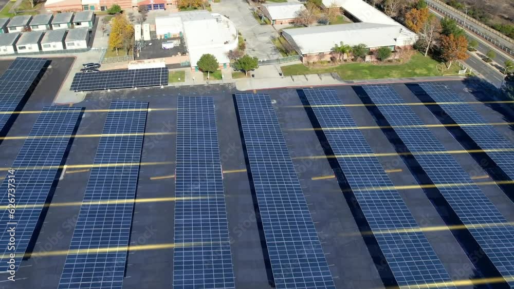 Solar power moving through photovoltaic cells at a EV car shelter - VFX ...