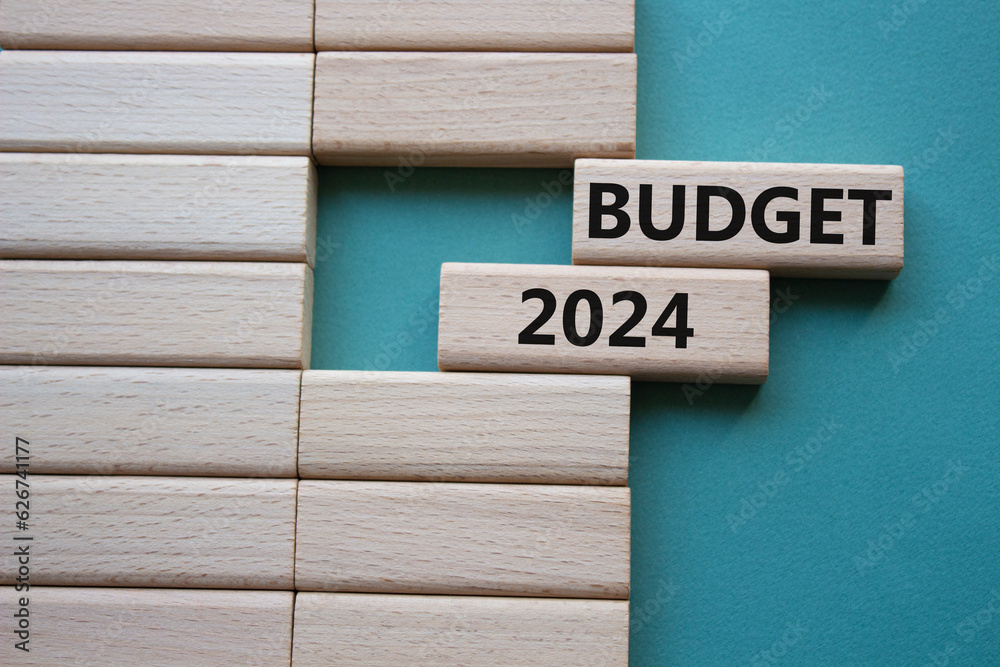 Budget 2024 symbol. Wooden blocks with words Budget 2024. Beautiful ...