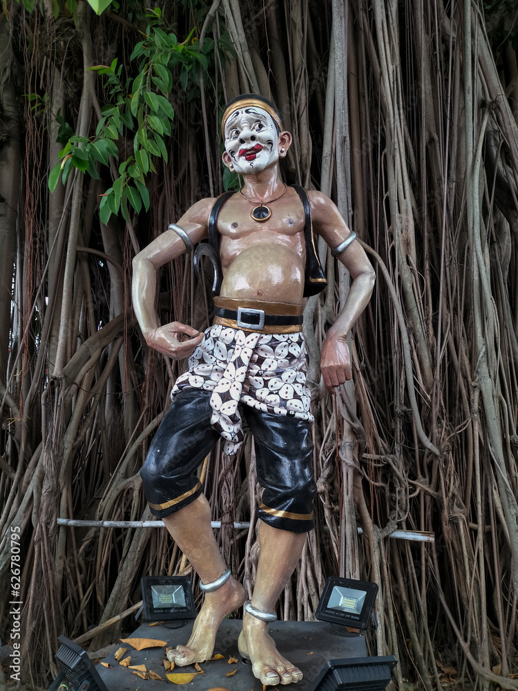 Statue of an Indonesian puppet character, Punokawan, consisting of ...