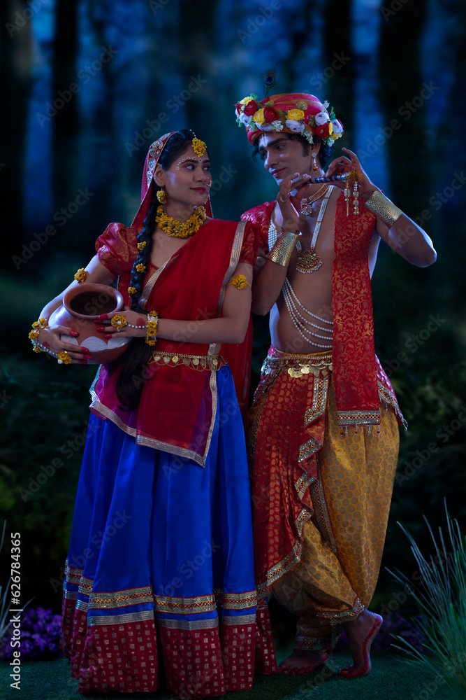 Young man and woman dressed up as Radha and Krishna on the occasion of ...