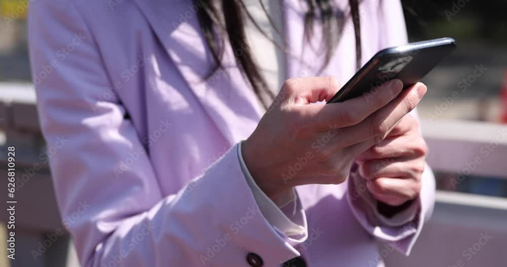 Body parts of hands using smartphne by Japanese woman at the street ...