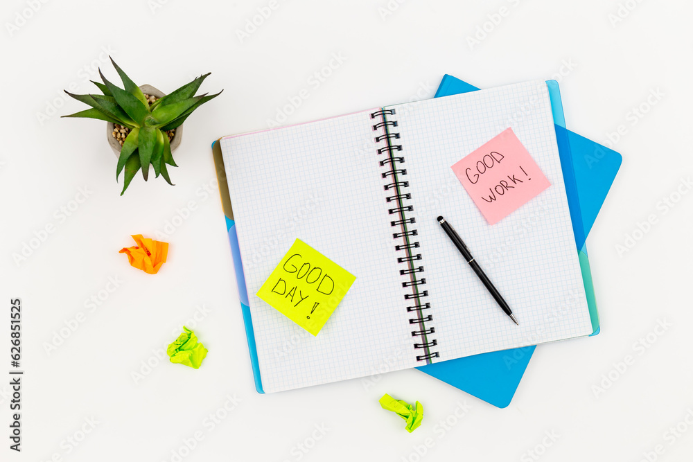 Notebooks, pen and paper reminders with a wish for good work. Stock ...