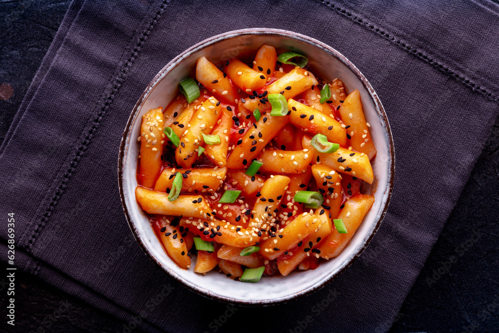 Tteokbokki or topokki, Korean street food, spicy rice cakes in red ...