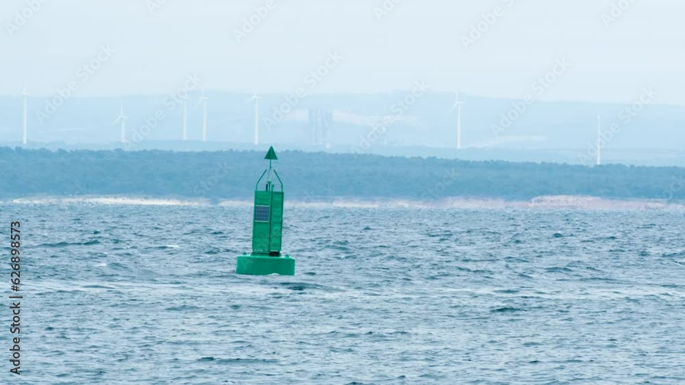 Green Navigation Buoy Floating on Sea. Moody Cloudy Weather ...