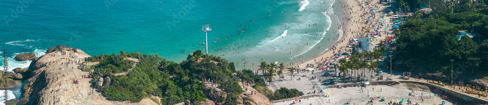 Aerial view of Diabo beach and Ipanema beach, Pedra do Arpoador. People sunbathing and playing ...