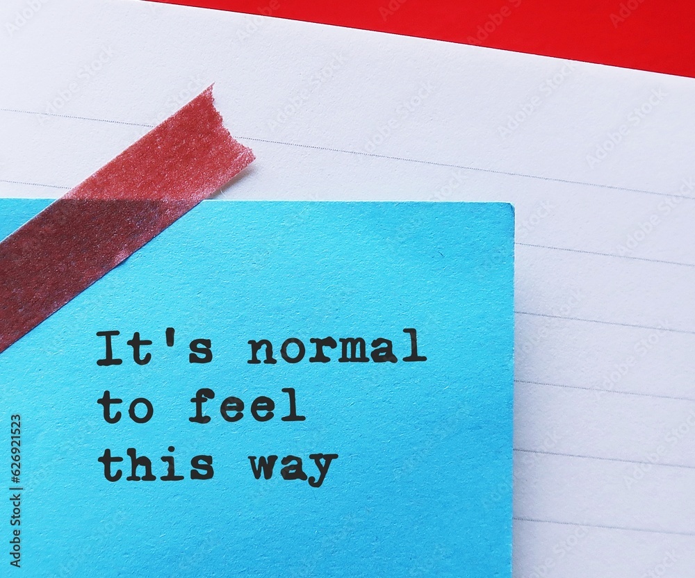 Notebook with handwritten text note - It’s normal to feel this way ...