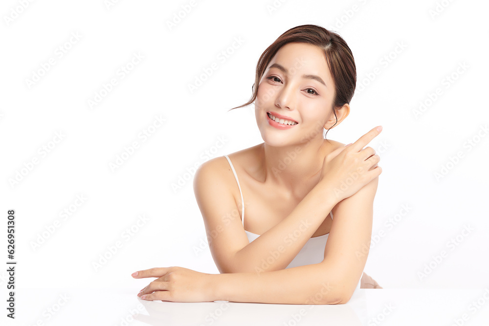 Beautiful young asian woman with clean fresh skin on white background ...