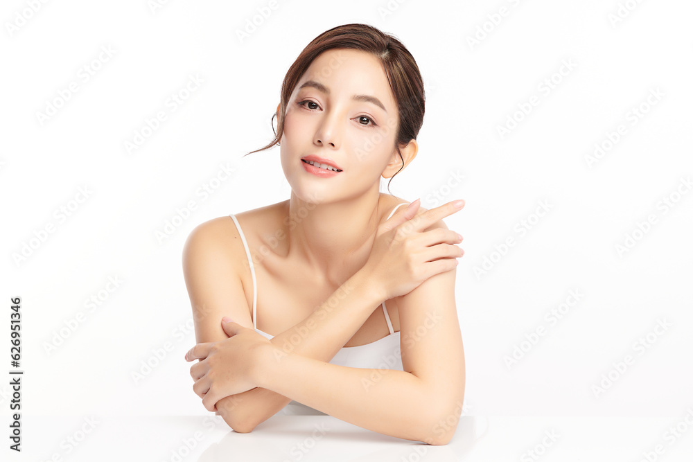 Beautiful young asian woman with clean fresh skin on white background ...