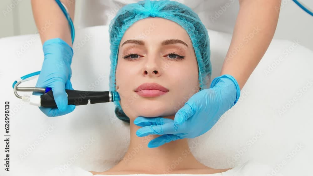 Perfect cleansing. Face of a beautiful pleasant woman being cleansed ...