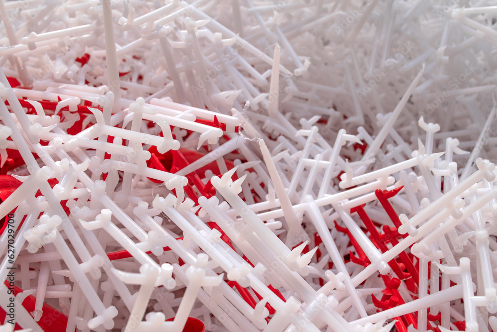 Recycling, reuse of plastic. Sprues from the production of plastic ...