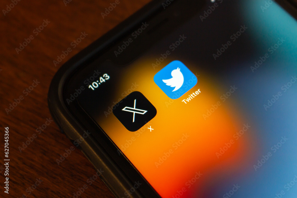 Vancouver, CANADA - Jul 24 2023 : The new X logo and Twitter icon are seen in an iPhone. In July ...