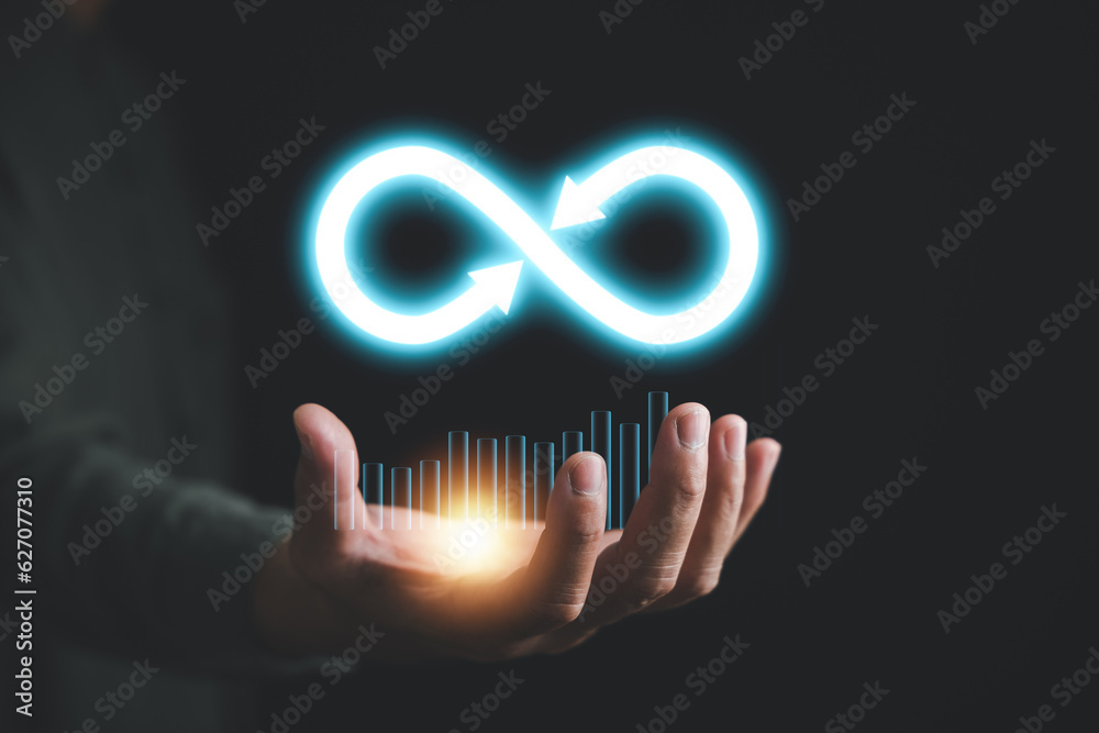 Businessman show circular infinity symbol on hand, depicting circular ...