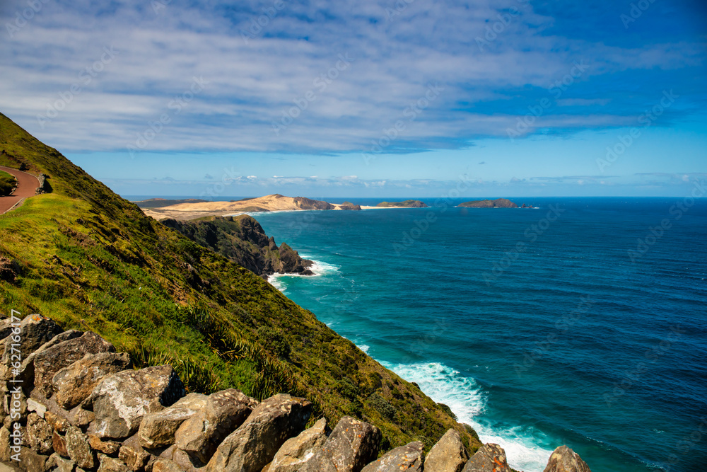 The spot where the Tasman sea and Pacific oceans meet at Cape Reinga ...