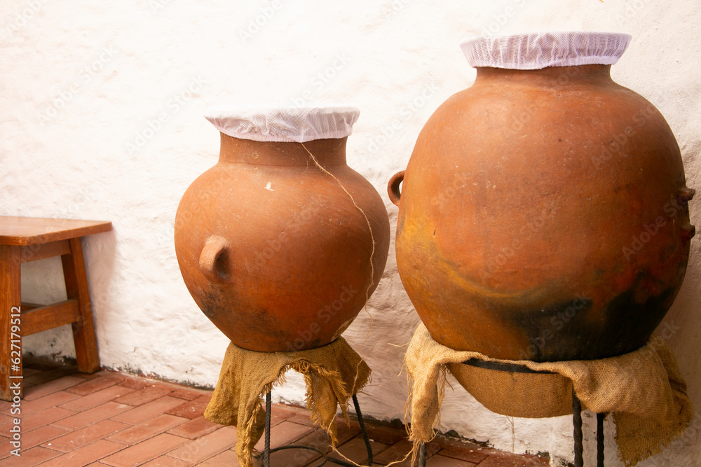 Chicha morada. Traditional peruvian drink prepared in clay pots, a ...