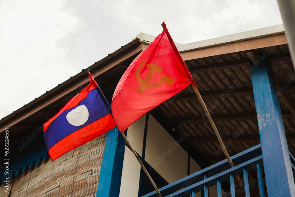 Laos flag and communist party flag decorated on laos people house Stock ...