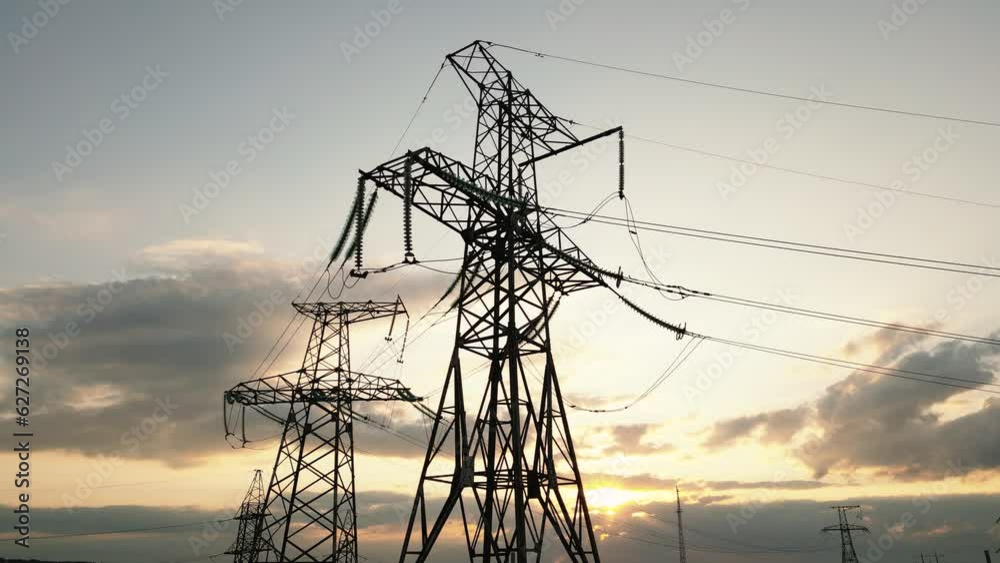 Transmission tower supporting an overhead high voltage power line ...
