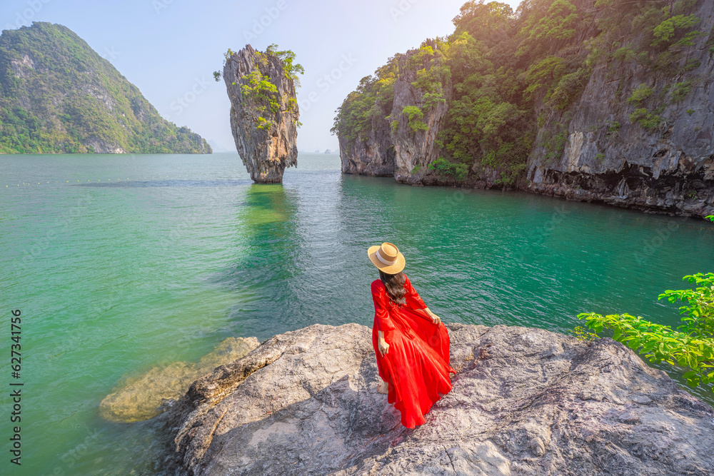 Traveler woman joy fun relaxing at Khao Tapu, also known as James Bond ...