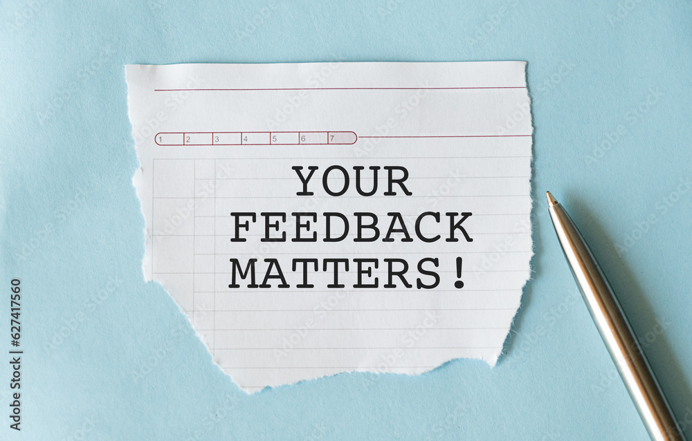 Text your feedback matters on white paper background, business concept ...
