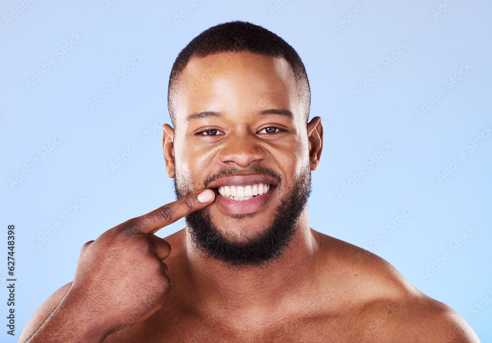 Teeth, dental care and portrait of black man mouth after cleaning or hygiene isolated in a blue ...