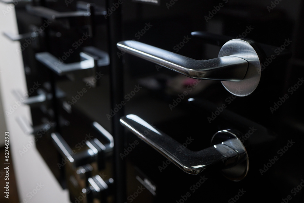 Door closers in a specialized store. Many different door and gate ...