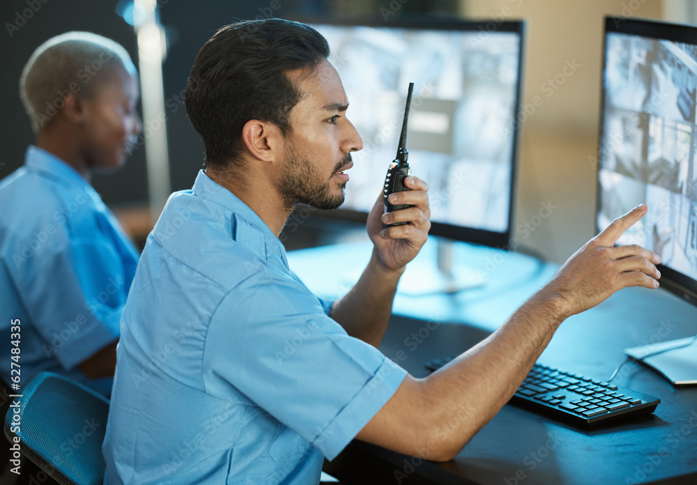 Control room, safety and security guard with a radio and computer ...