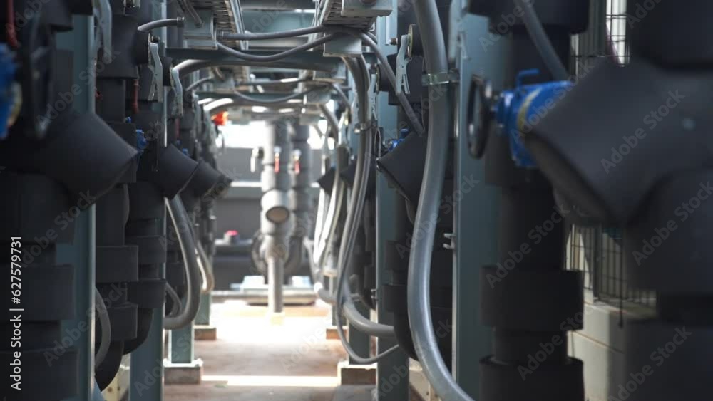 Engineers check control systems for the proper functioning of critical ...