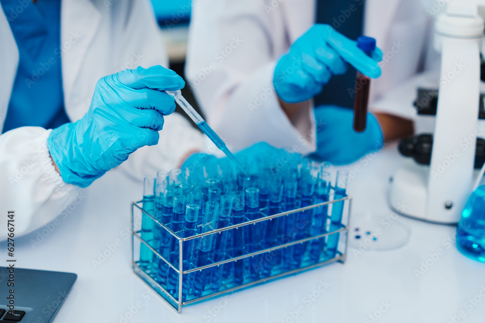 Health care researchers working in life science laboratory, Teaching in ...