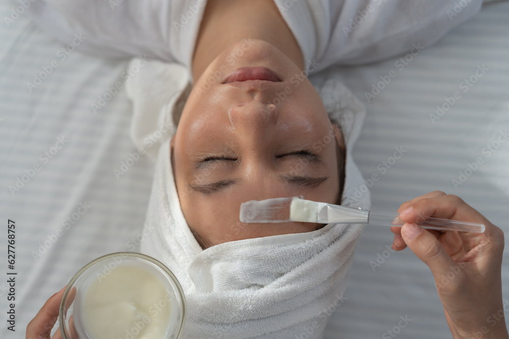Beautiful woman recieve spa and treatment skin of face. face of a ...